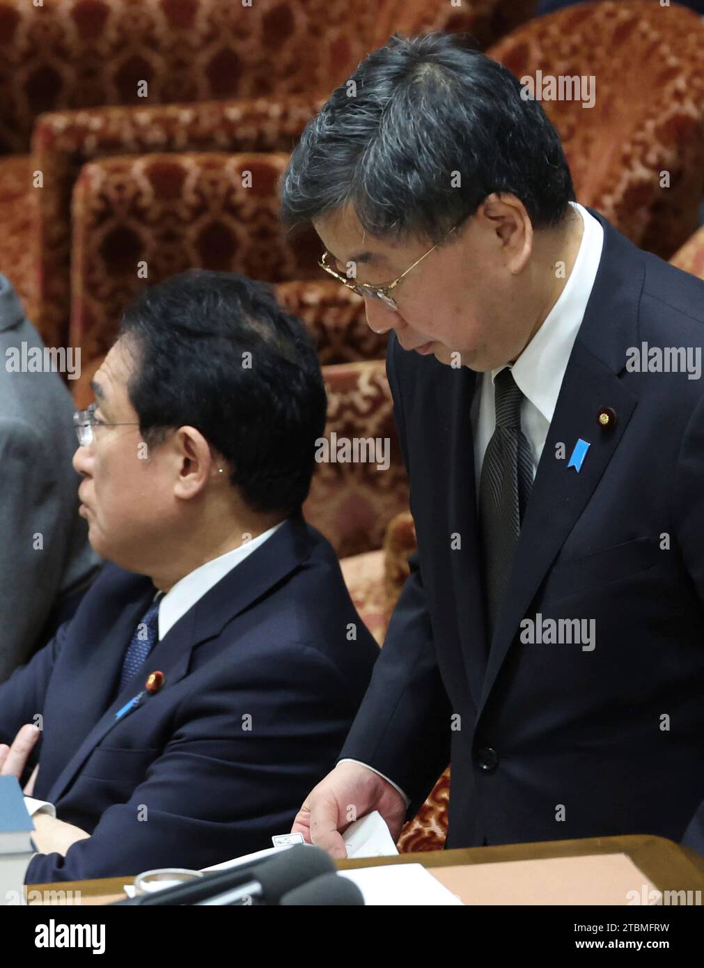 Japan's Prime Minister Fumio Kishida and Chief Cabinet Secretary Hirokazu Matsuno attend a ...