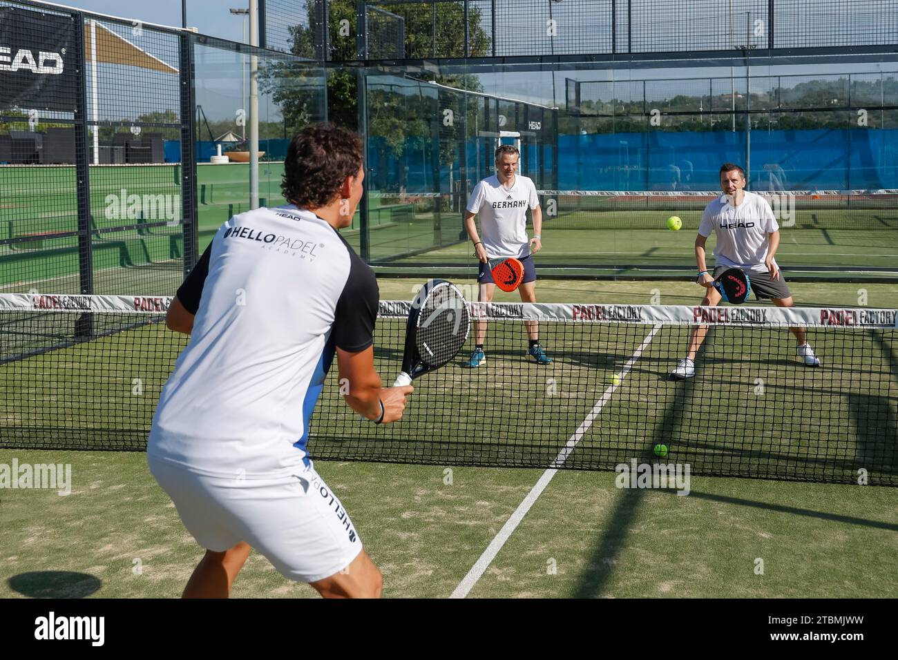 Padel instructor teaching players at a padel camp, Club Robinson ...