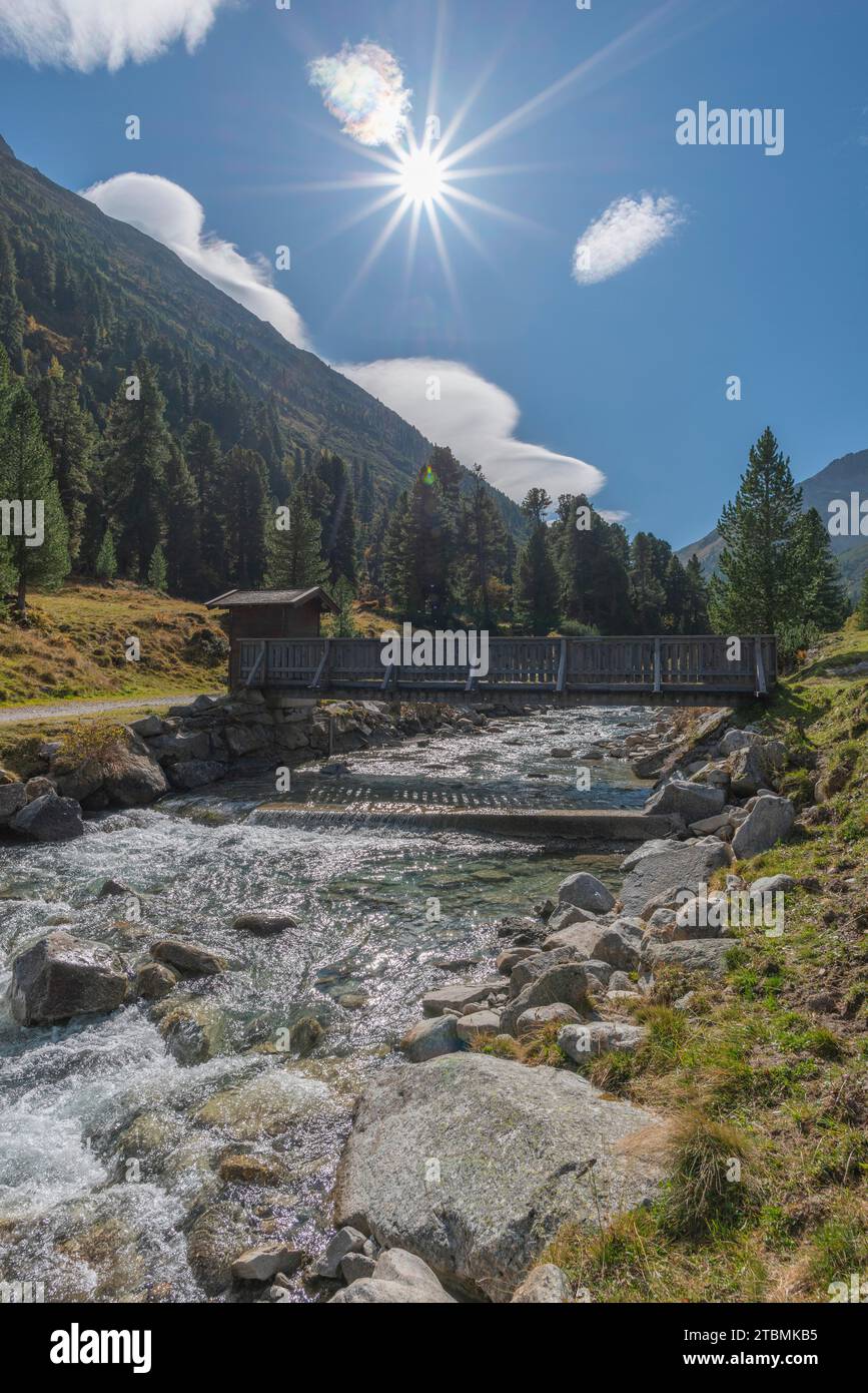 Wooden bridge over Zamser Bach in the valley Zamser Grund, Schlegeis ...