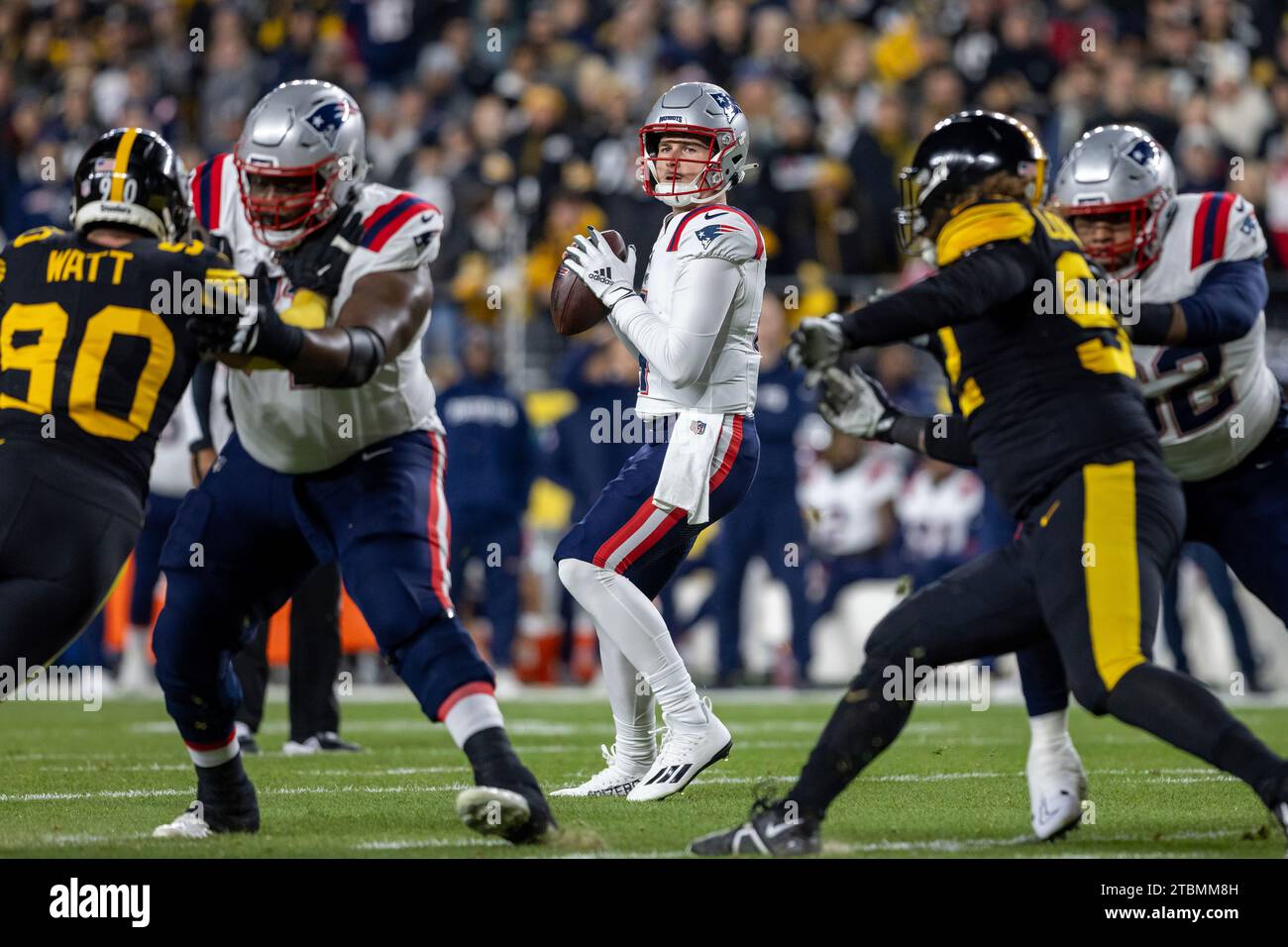 New England Patriots quarterback Bailey Zappe (4) looks to throw during ...