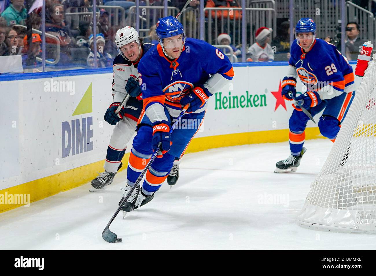 New York Islanders defenseman Ryan Pulock (6) looks to pass the puck ...