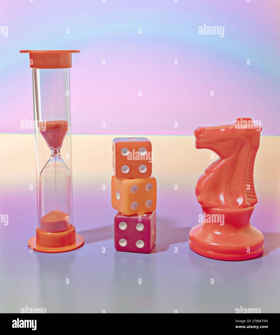 A Game Night Sand Timer, Dice and Chess Knight Piece in a Board Game ...