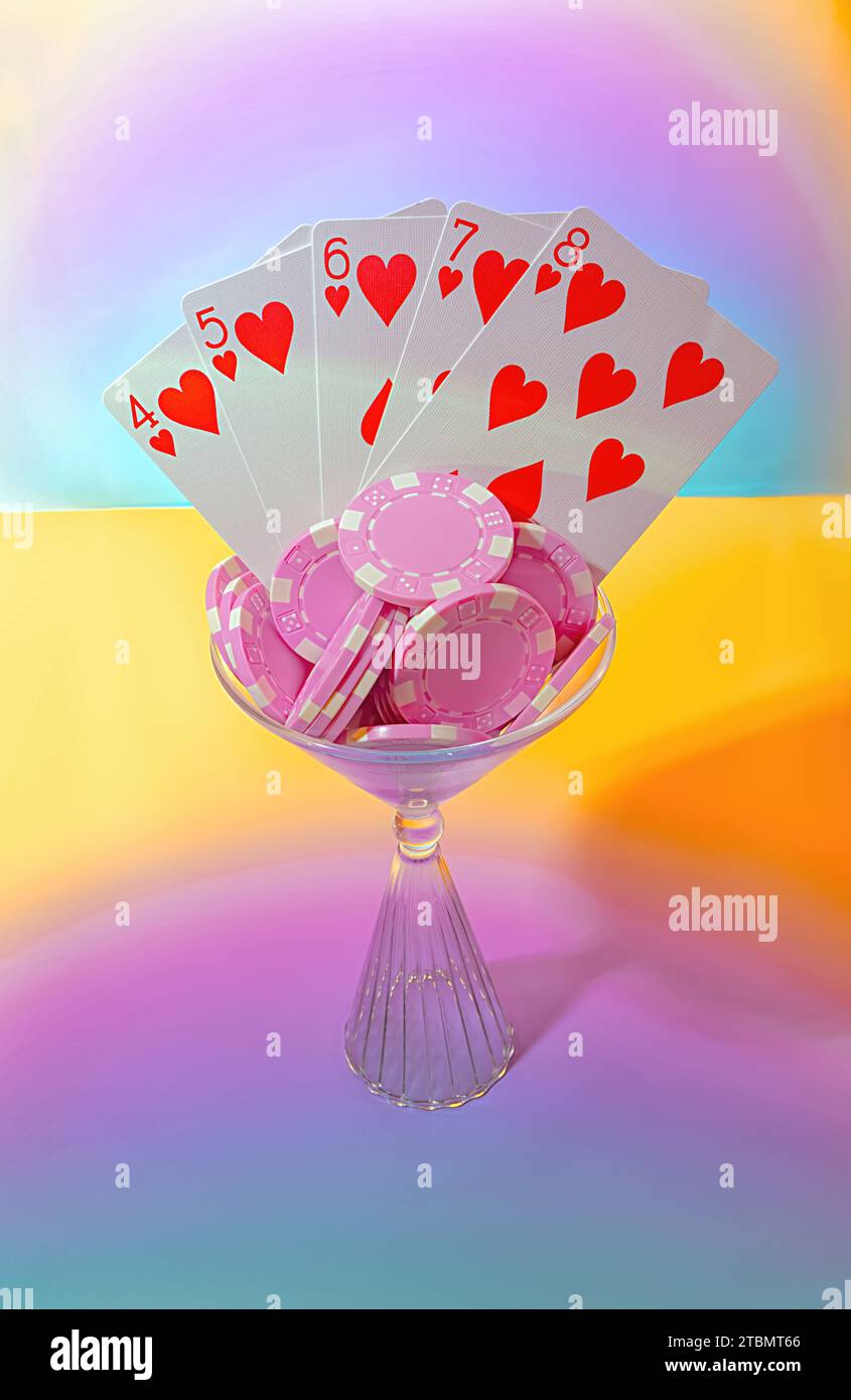 A Red Hearts Straight Flush Poker Hand and Pink Poker Chips in a ...