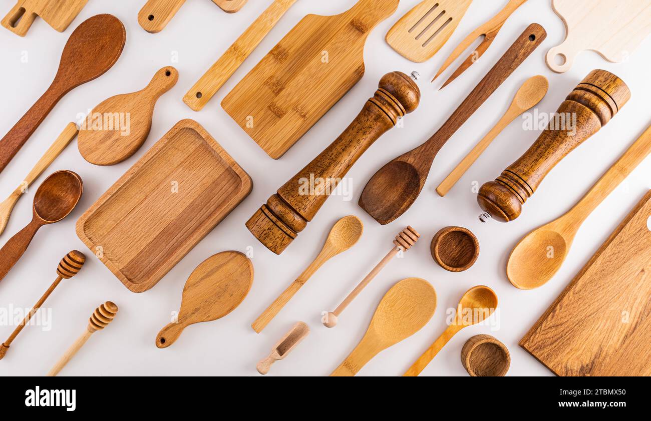 Kitchen wooden utensils, cooking tools on white background. Flat ...