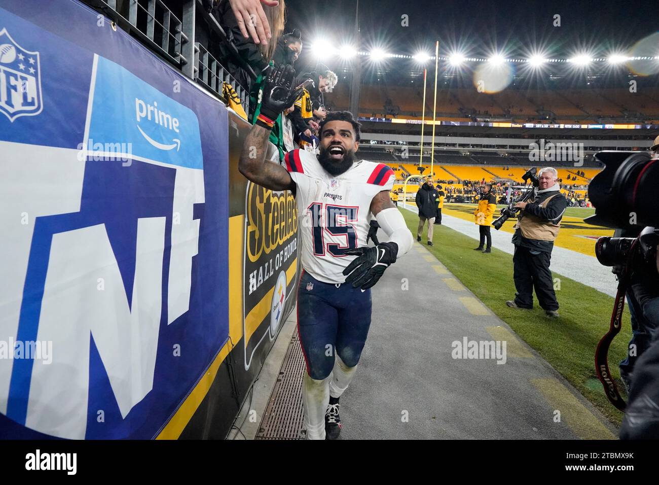 New England Patriots running back Ezekiel Elliott heads off the field ...