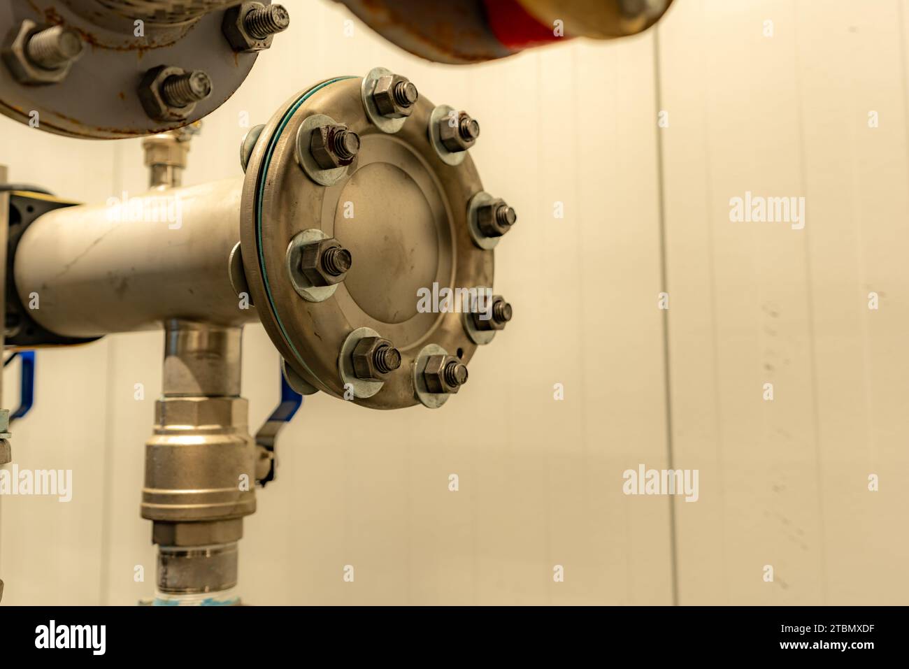 The interior of a mechanical room and a domestic potable water system ...