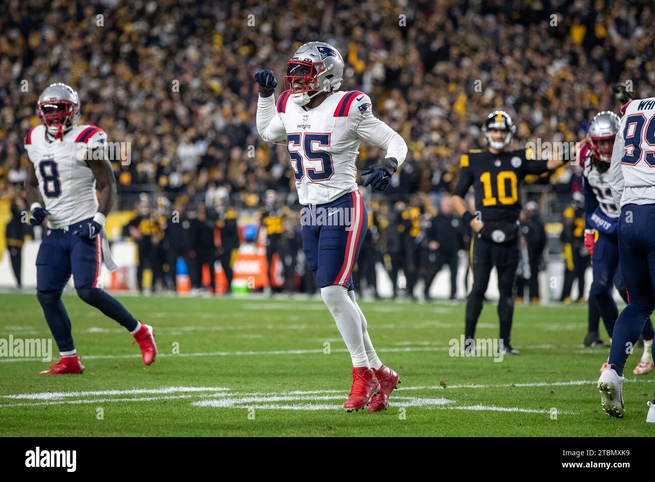 New England Patriots linebacker Josh Uche (55) reacts during an NFL ...