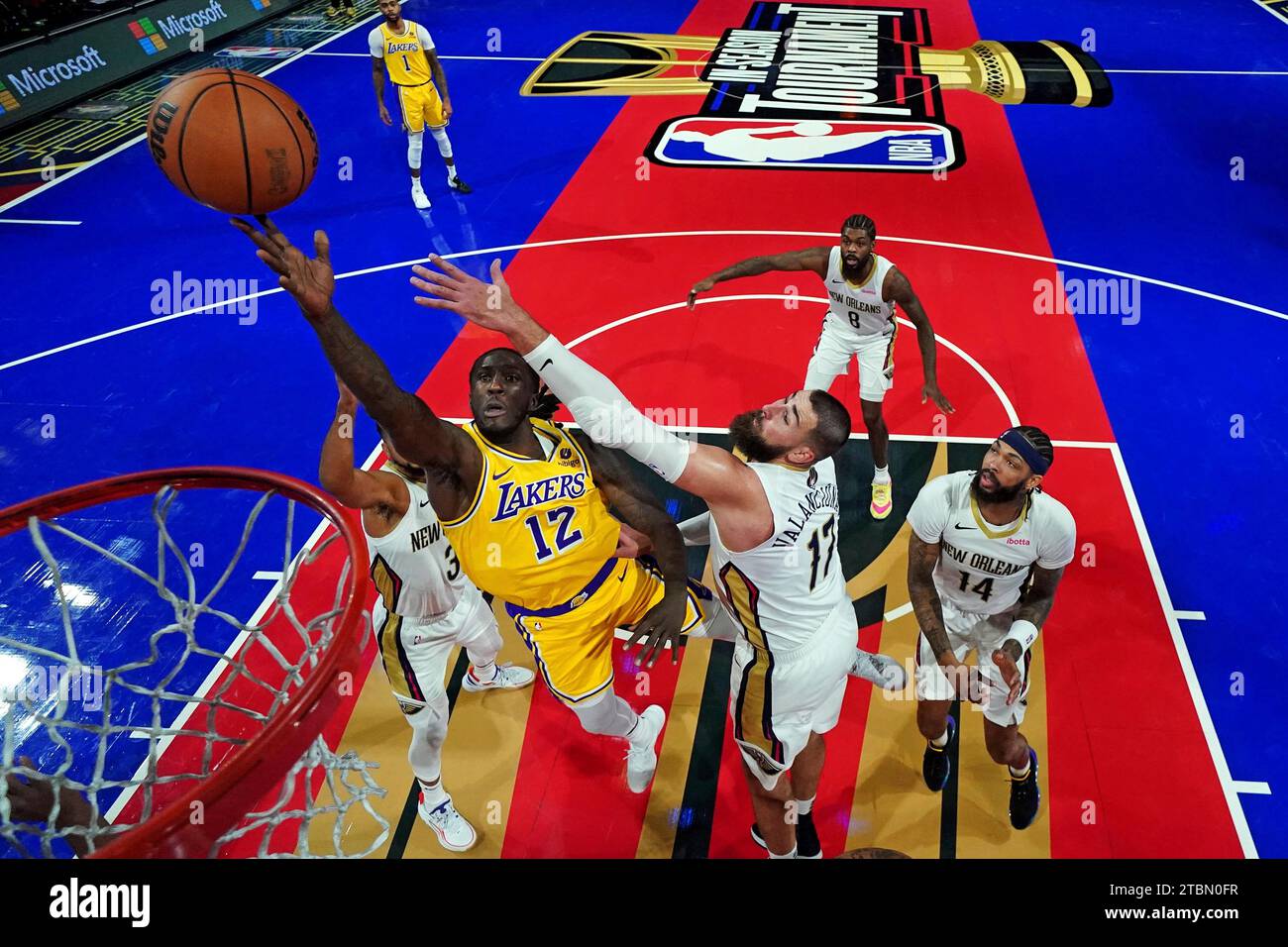 Los Angeles Lakers forward Taurean Prince (12) shoots the ball against ...
