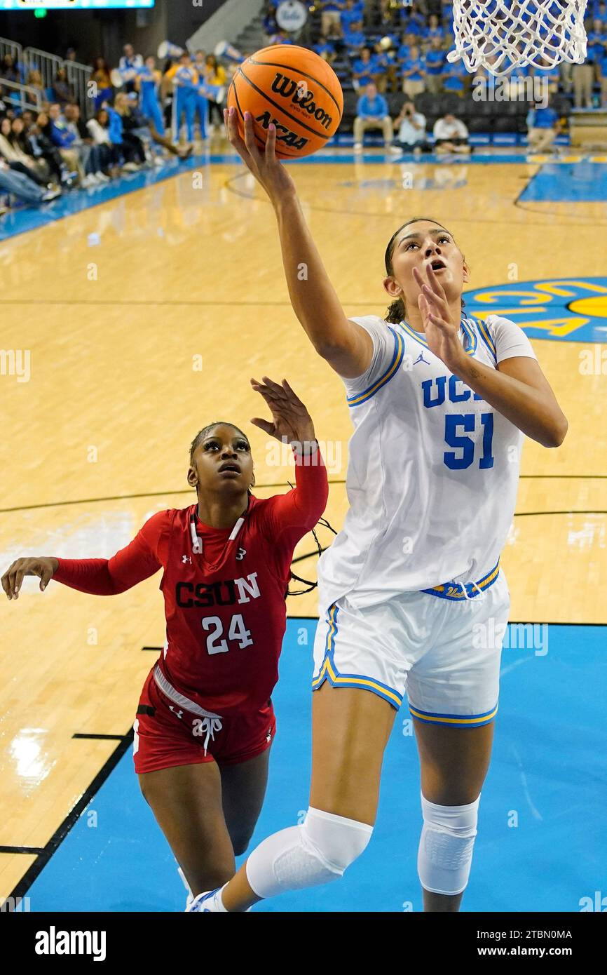 UCLA center Lauren Betts, right, shoots as Cal State Northridge forward ...
