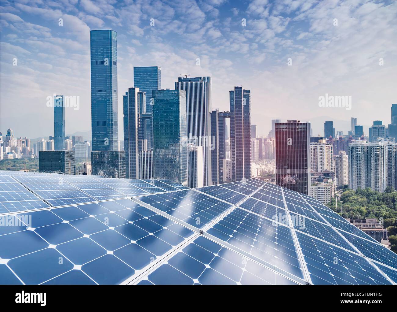 Ecological energy renewable solar panel plant with urban landscape ...