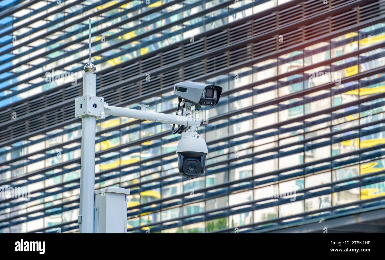 Outdoor CCTV surveillance camera on building window Stock Photo - Alamy