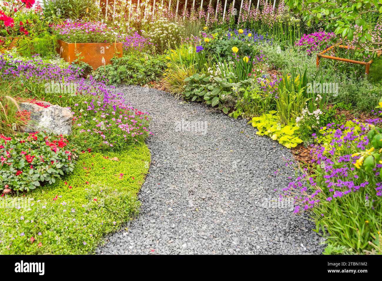 rock path leading through a garden Stock Photo - Alamy