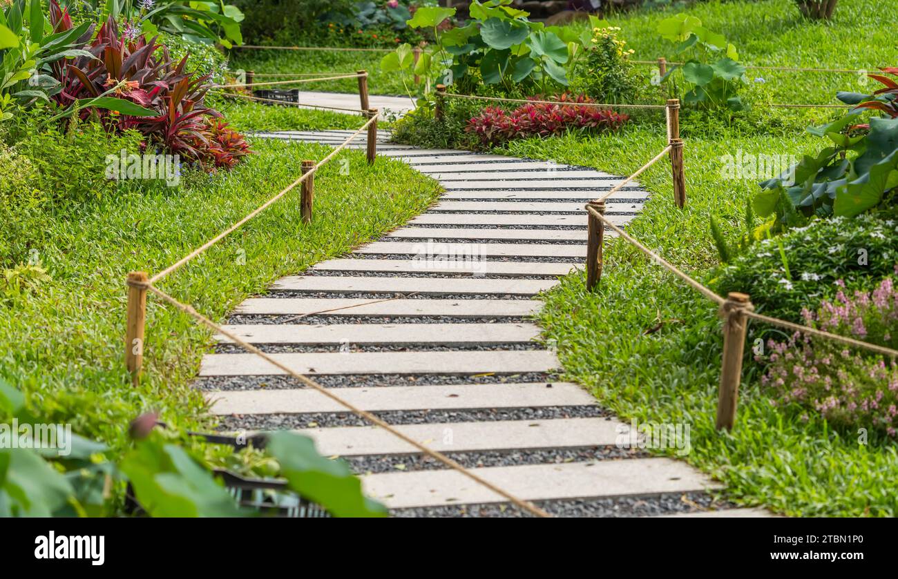 rock path leading through a garden Stock Photo - Alamy