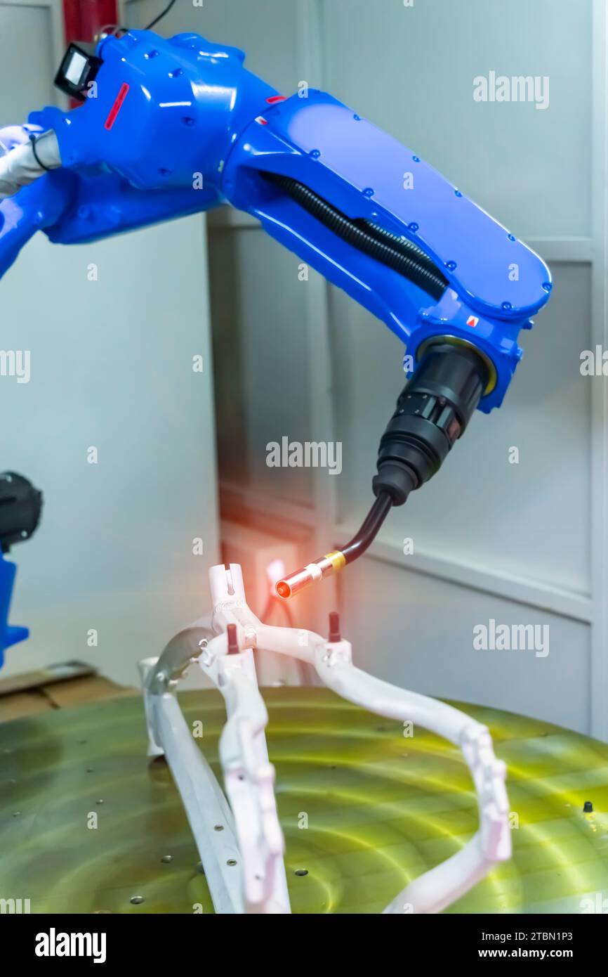 Automatic robotic arm for metal welding operations Stock Photo - Alamy