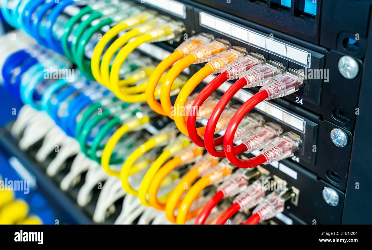 Network panel, switch and cable in data center Stock Photo - Alamy