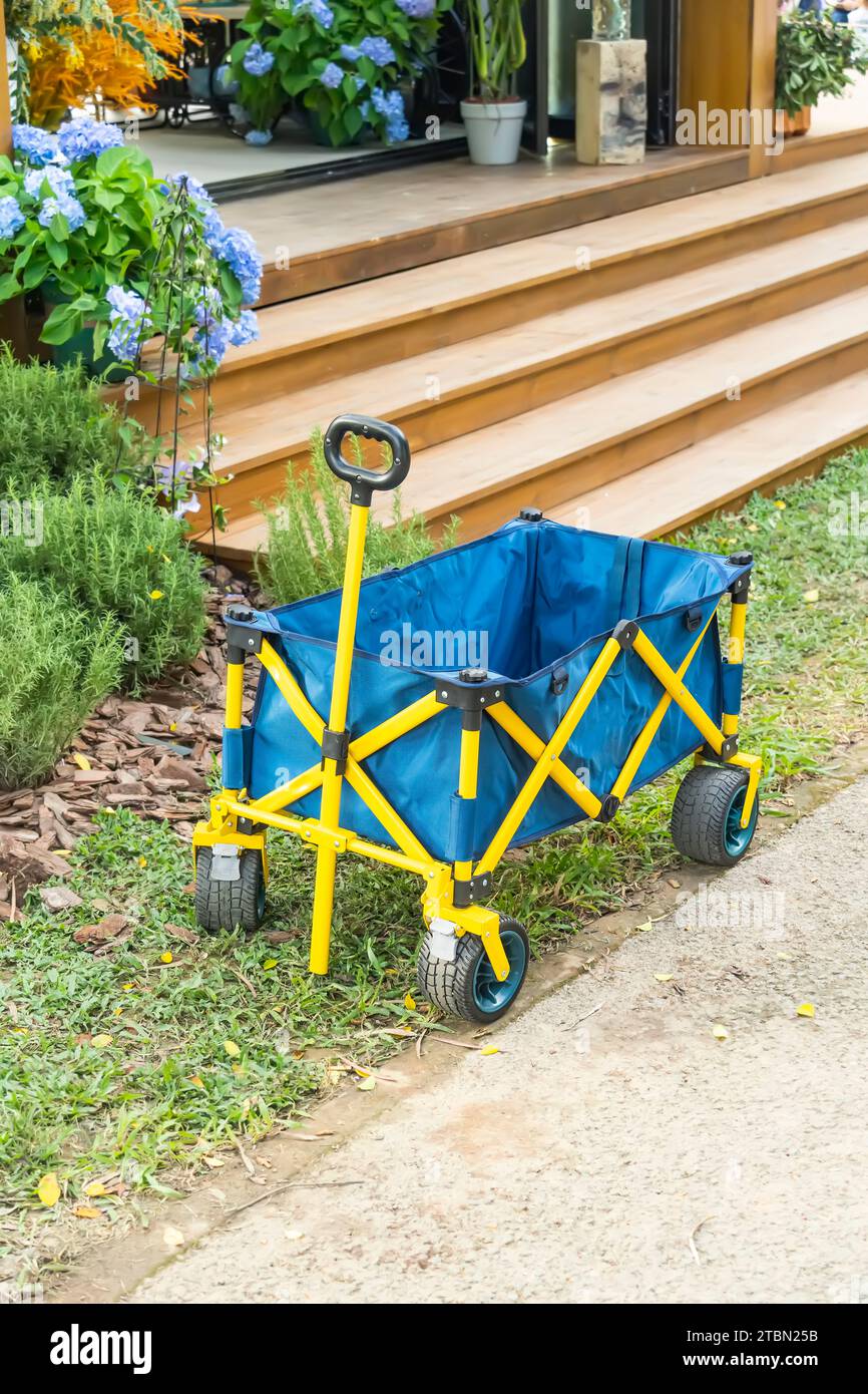 blue cart for using in camping life travel Stock Photo - Alamy
