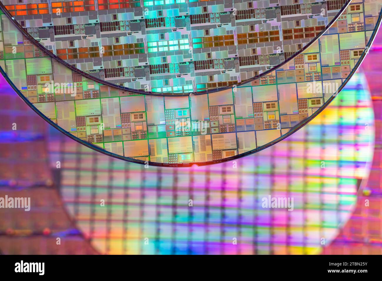 Silicon Wafers with microchips used in electronics for the fabrication ...
