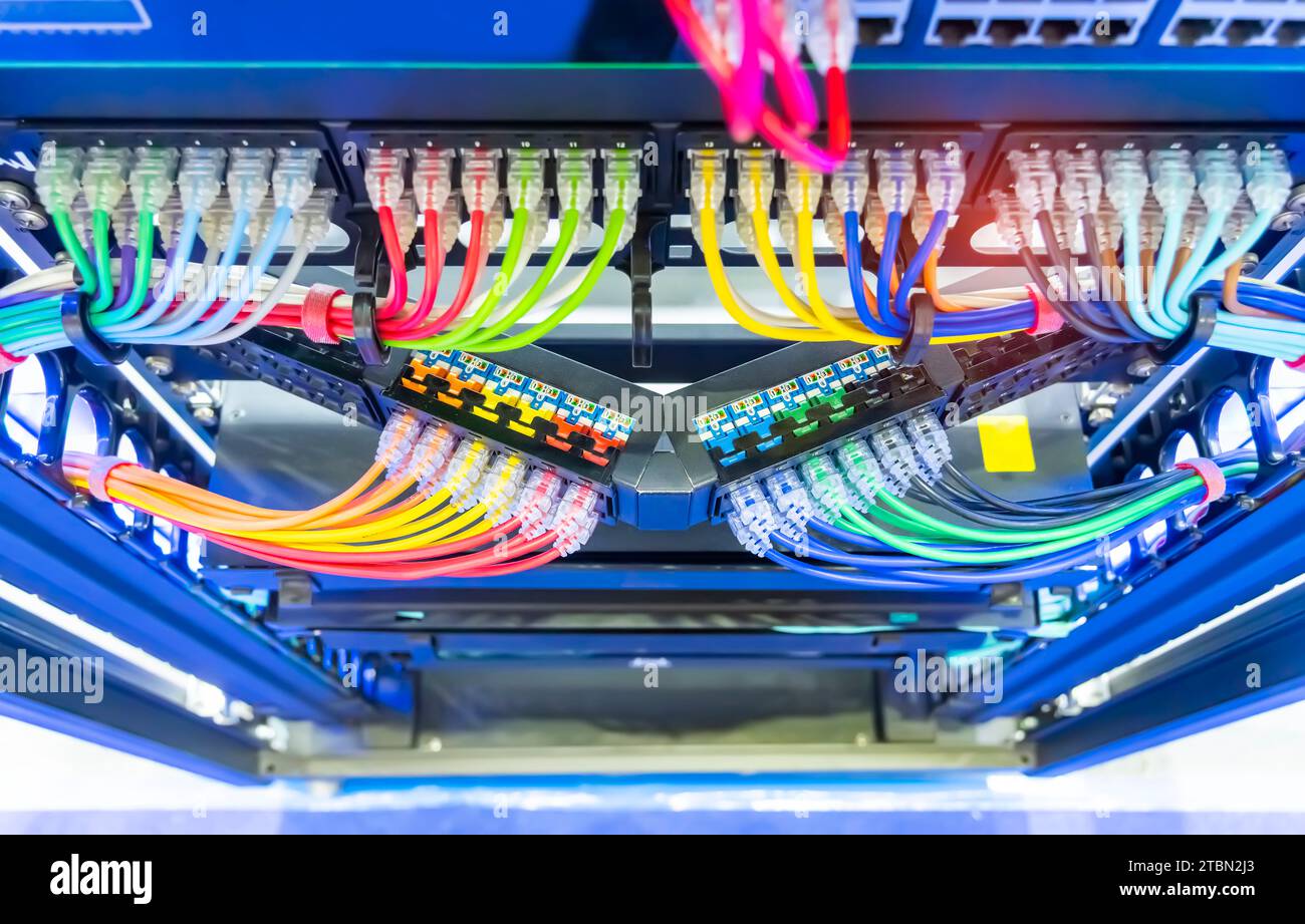 Network panel, switch and colorful cable in data center Stock Photo - Alamy