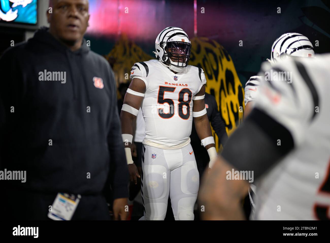 Cincinnati Bengals defensive end Joseph Ossai (58) heads to the field ...