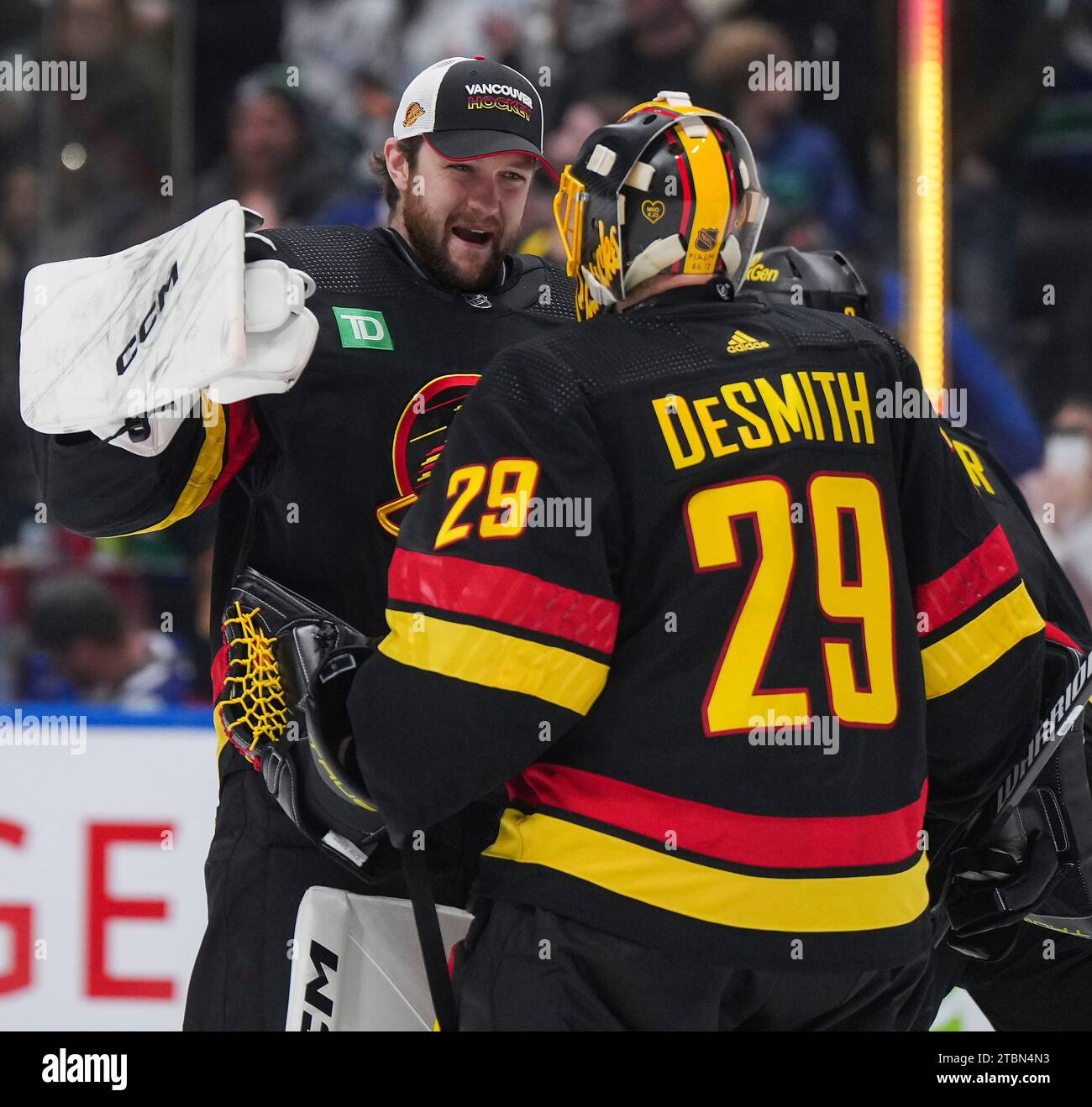 Vancouver Canucks goalie Thatcher Demko, left, congratulates goalie ...