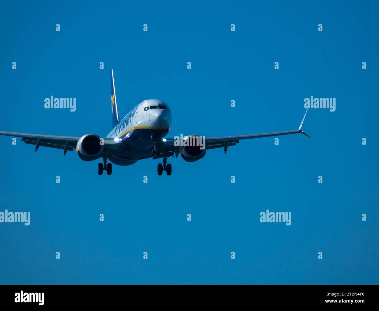 Airplane from the ryan air on approach for landing hi-res stock ...