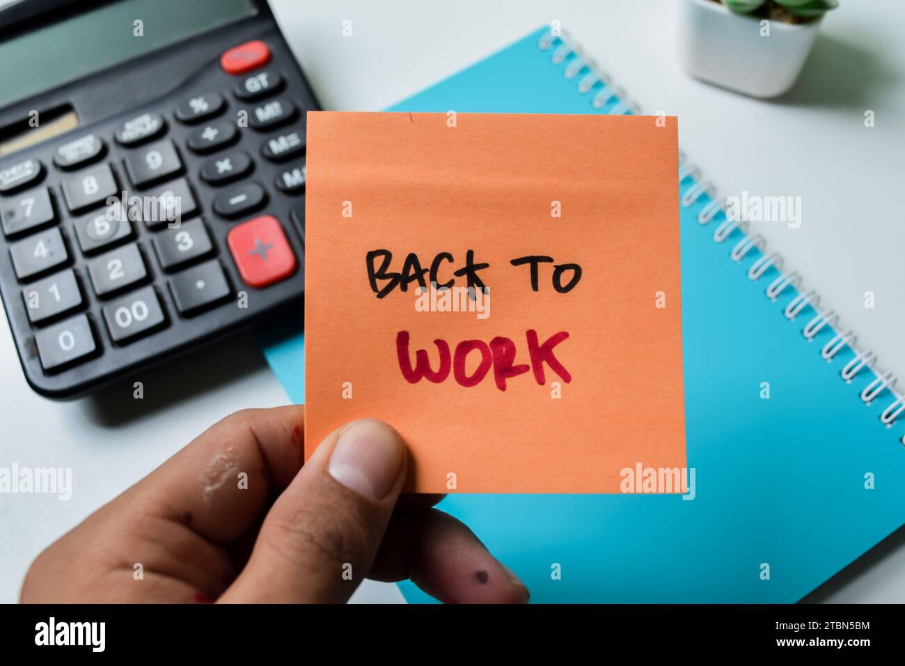 Concept of Back to Work write on sticky notes isolated on white ...