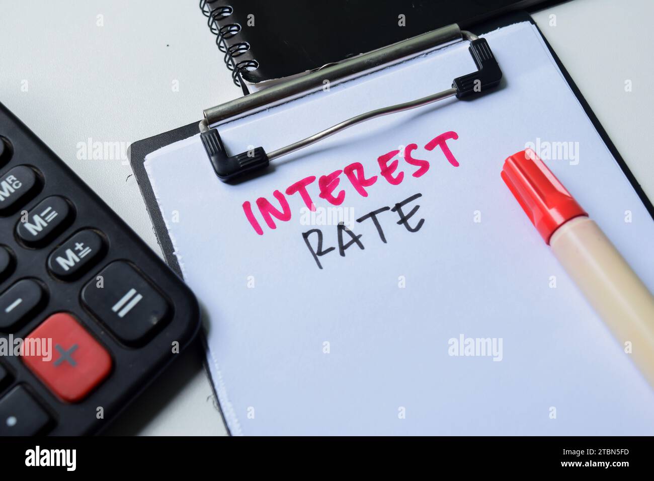 Concept of Interest Rate write on paperwork isolated on white ...
