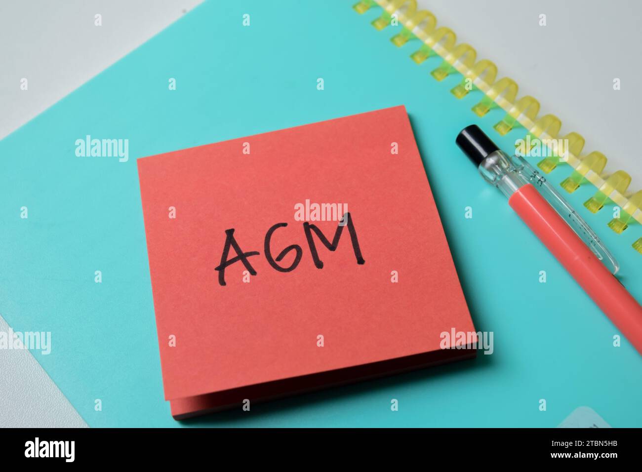 Concept of AGM write on sticky notes isolated on white background Stock ...