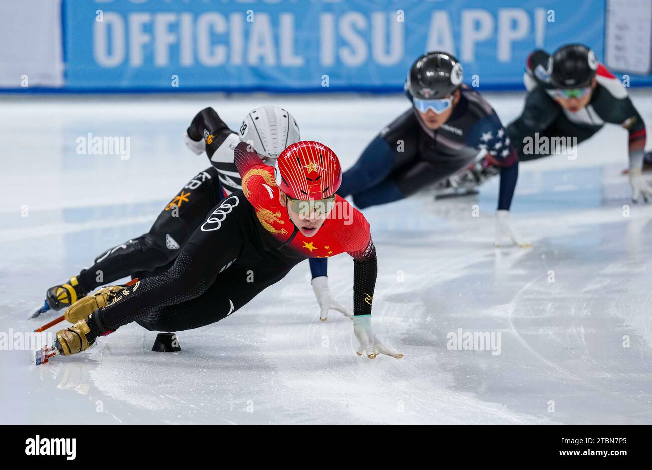 Beijing, China. 8th Dec, 2023. Lin Xiaojun (front) of China competes ...