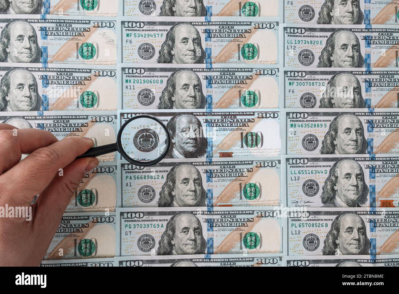 Counterfeiter forges banknotes. Fake concept. Fake money American ...