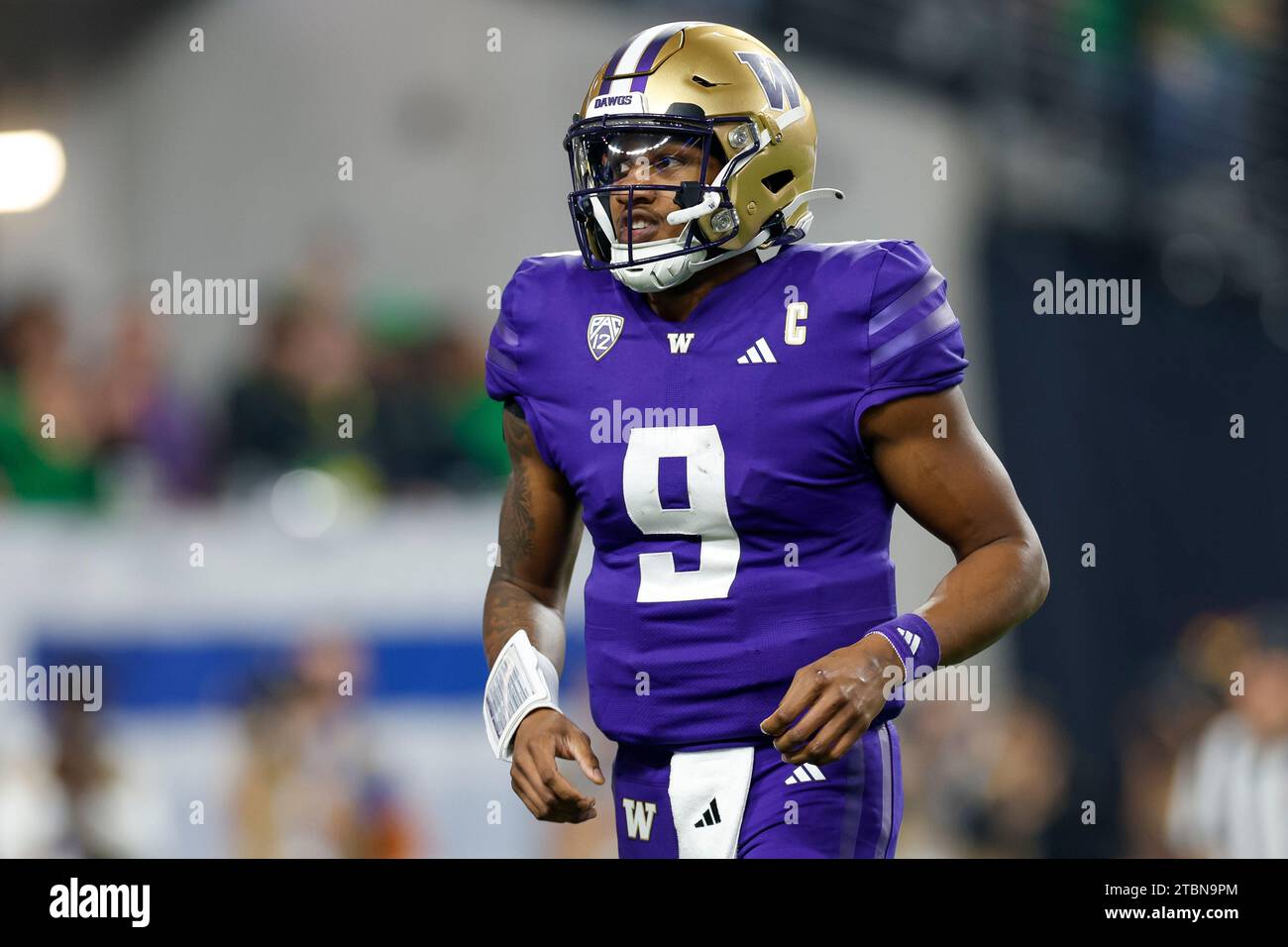 Washington Huskies quarterback Michael Penix Jr. (9) reacts during the Pac-12 Championship game ...