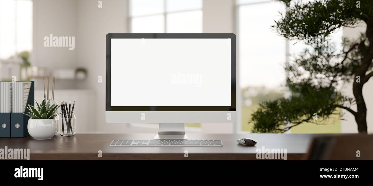 A modern office workspace with a PC computer white monitor mockup ...