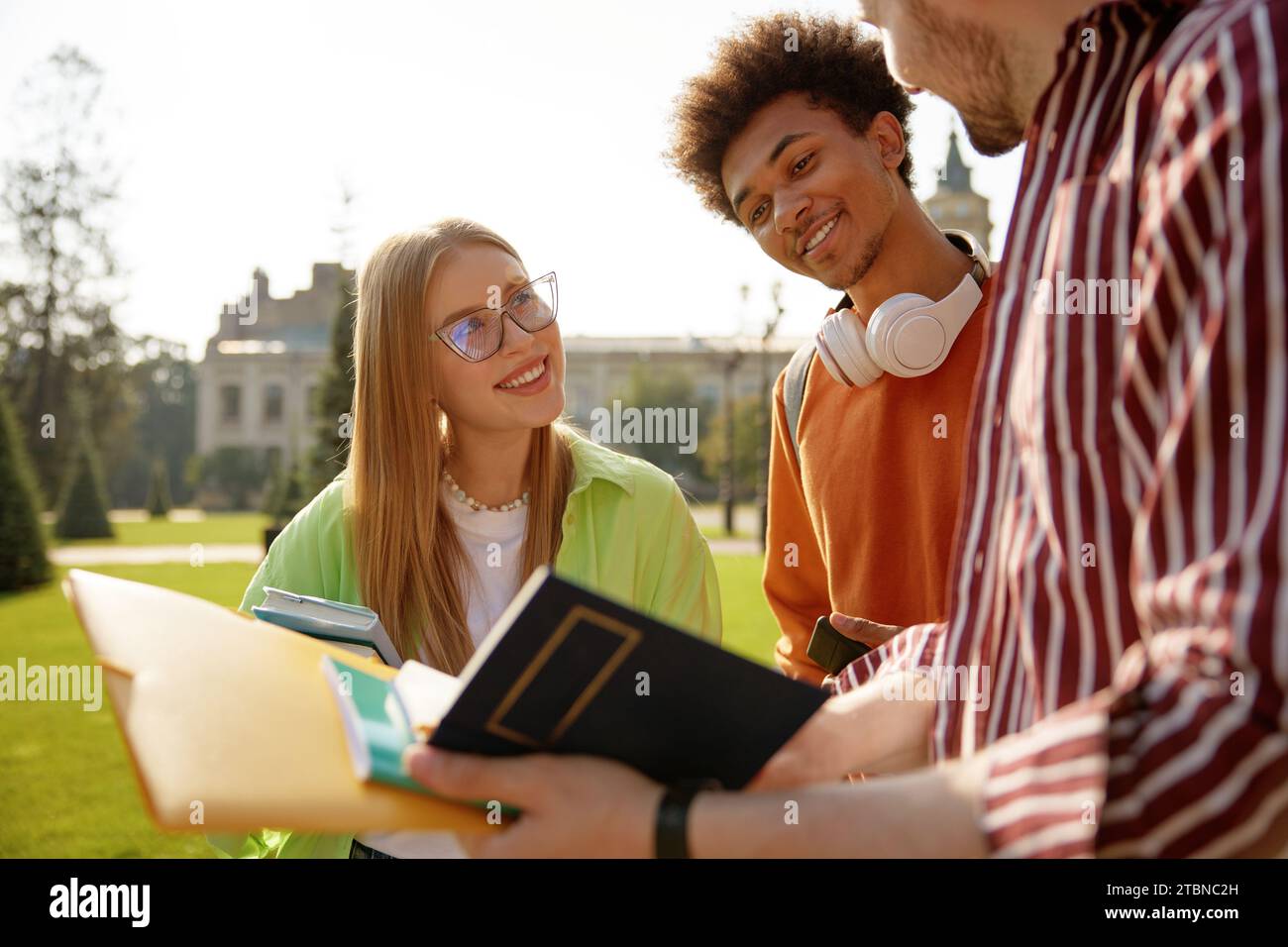 Teenage students discussing class hi-res stock photography and images ...