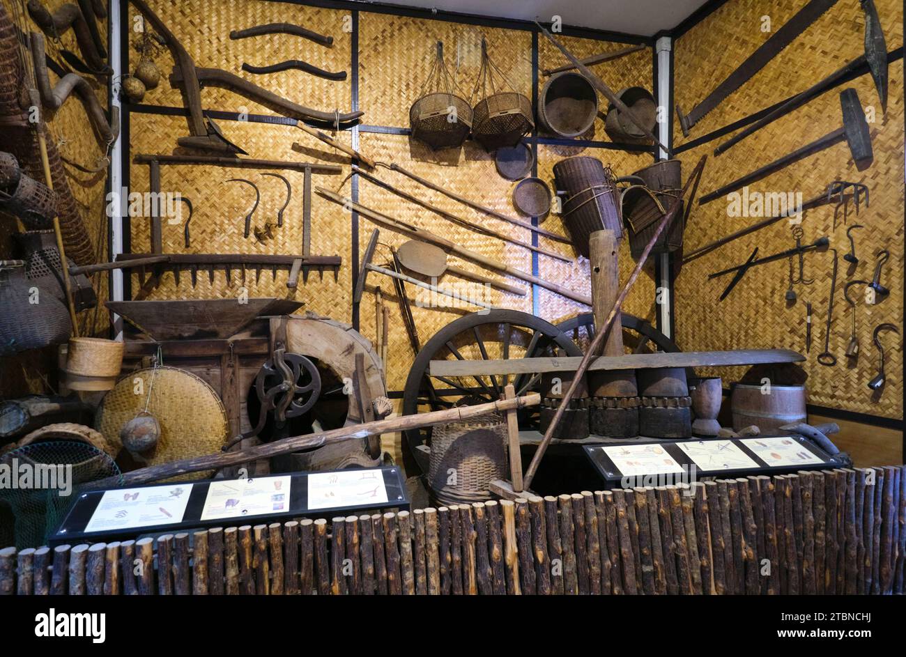 A display of old baskets and other tools used in agriculture. At the ...