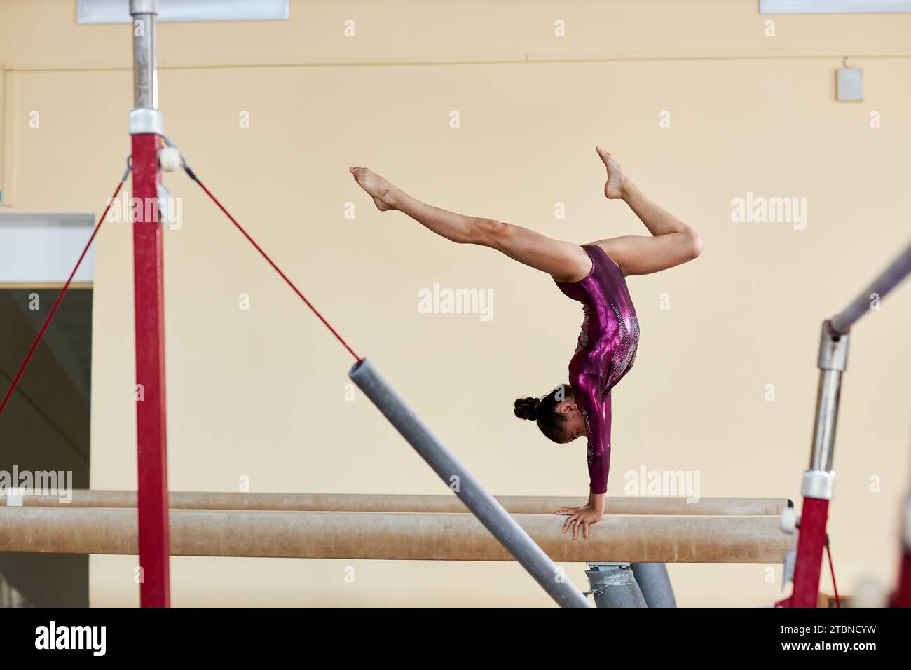Skilled Female Gymnast Practicing Single Stag Handstand Stock Photo - Alamy