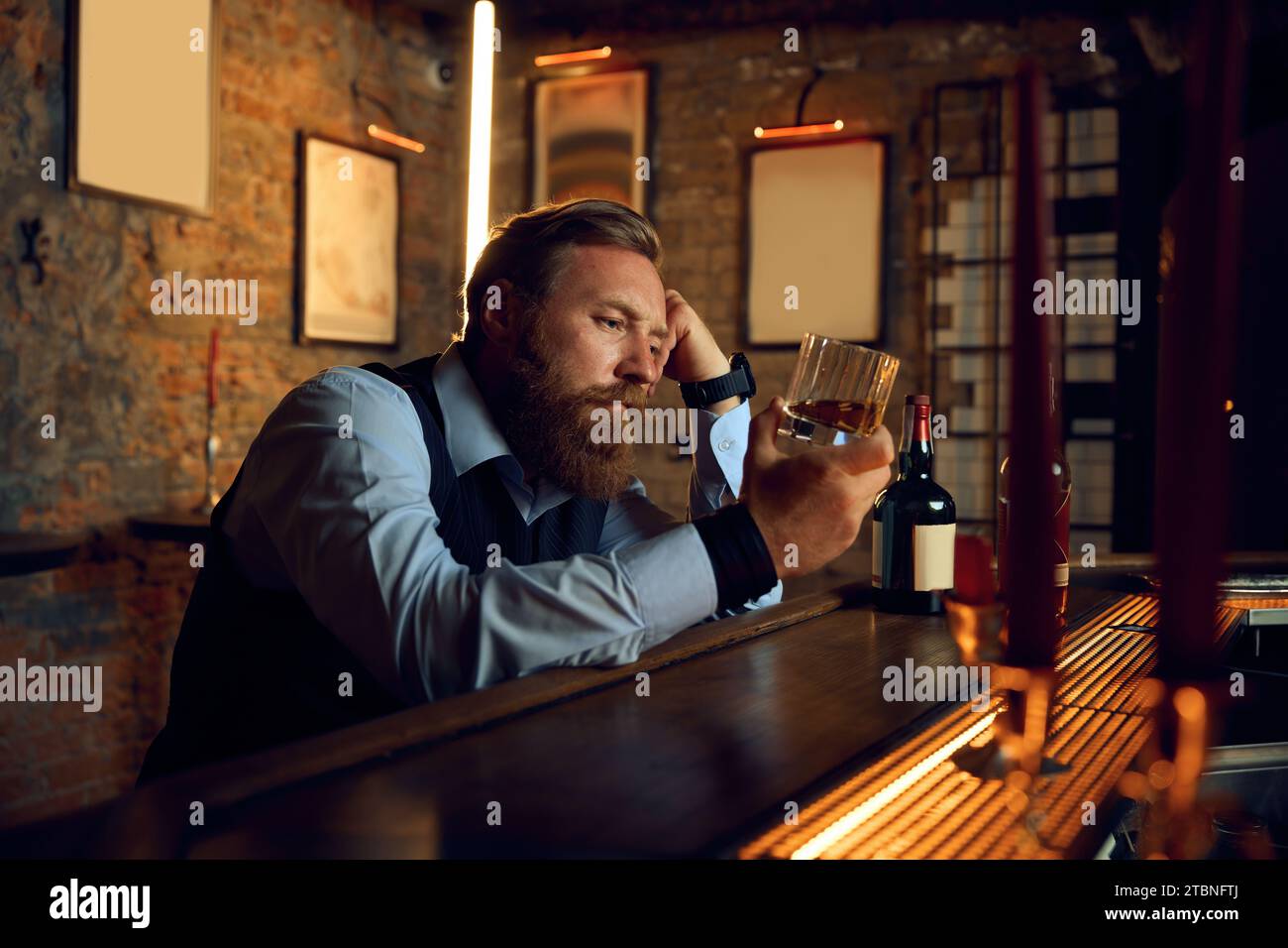 Elegant mature man drinking whiskey hi-res stock photography and images ...