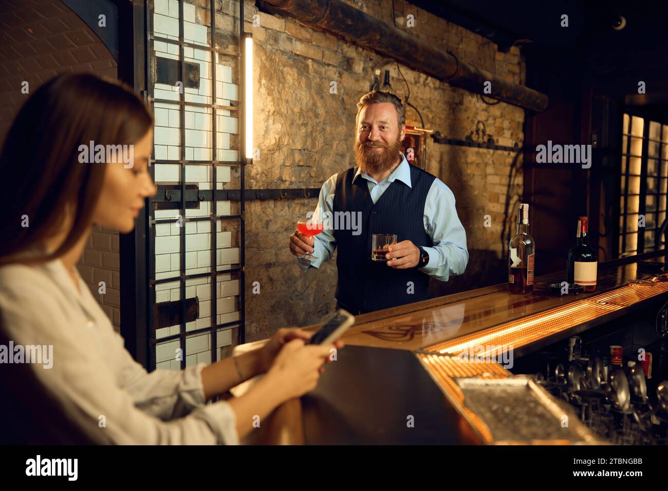 Man woman bar counter courting hi-res stock photography and images - Alamy