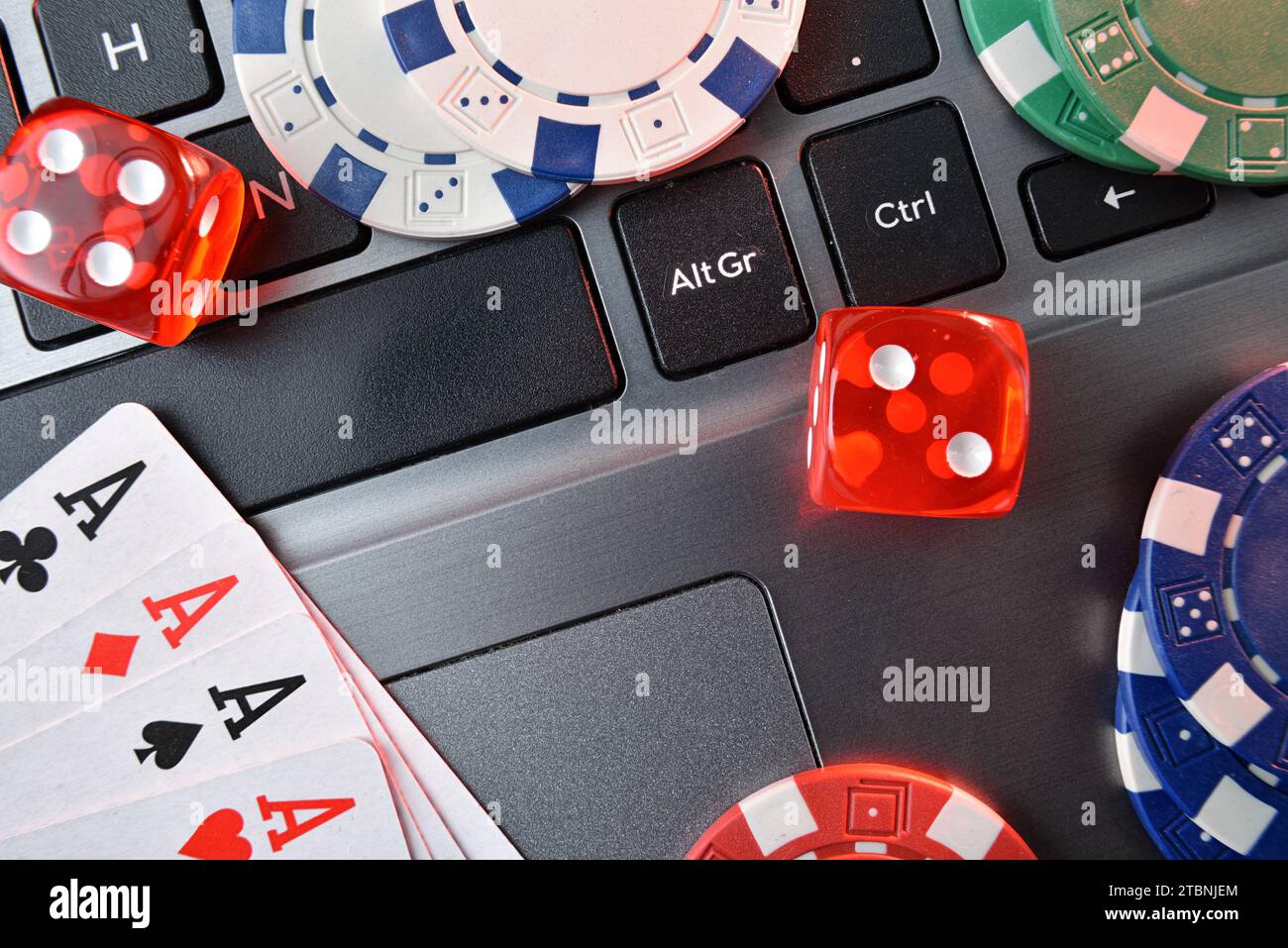 Playing poker on his laptop hi-res stock photography and images - Alamy
