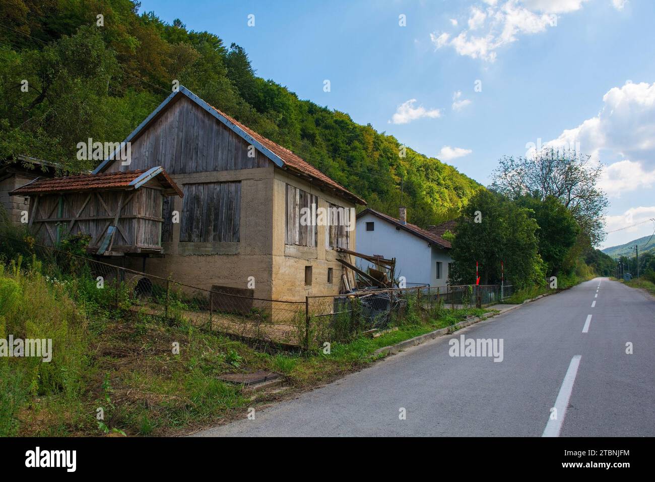 Houses on a country road just north of Martin Brod, Bihac, in the Una ...