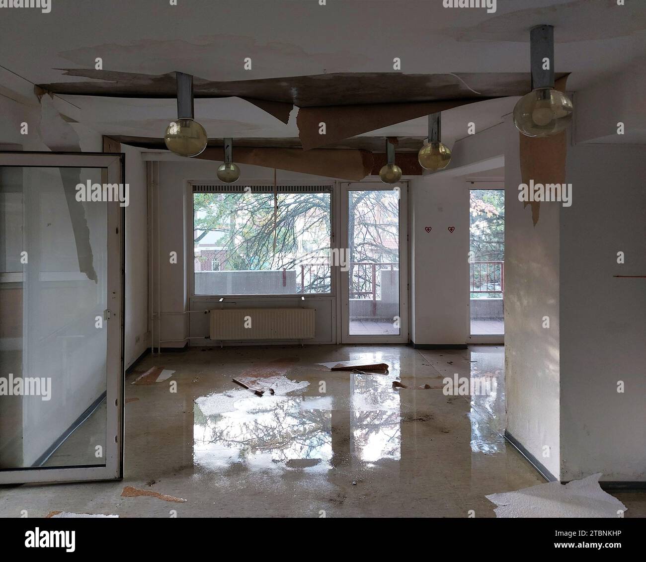 Water damage in interior room of abandoned building Stock Photo - Alamy