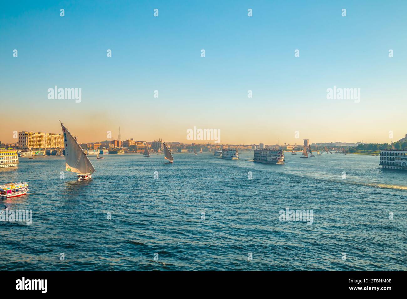 Traditional felucca boats on the Nile River in Aswan. Magnificent view ...