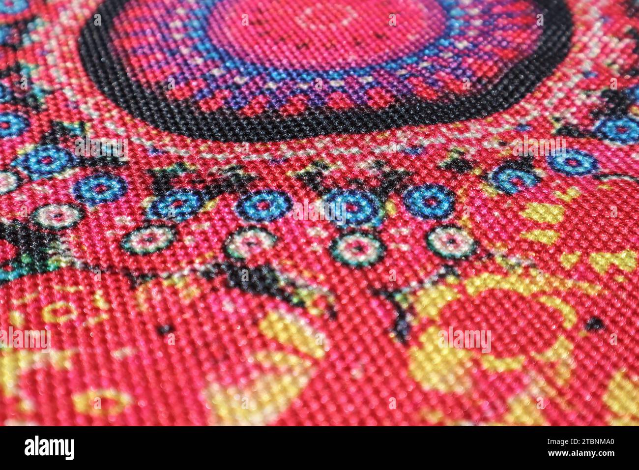 Red jute type cloth texture background. Circle round design of cloth ...