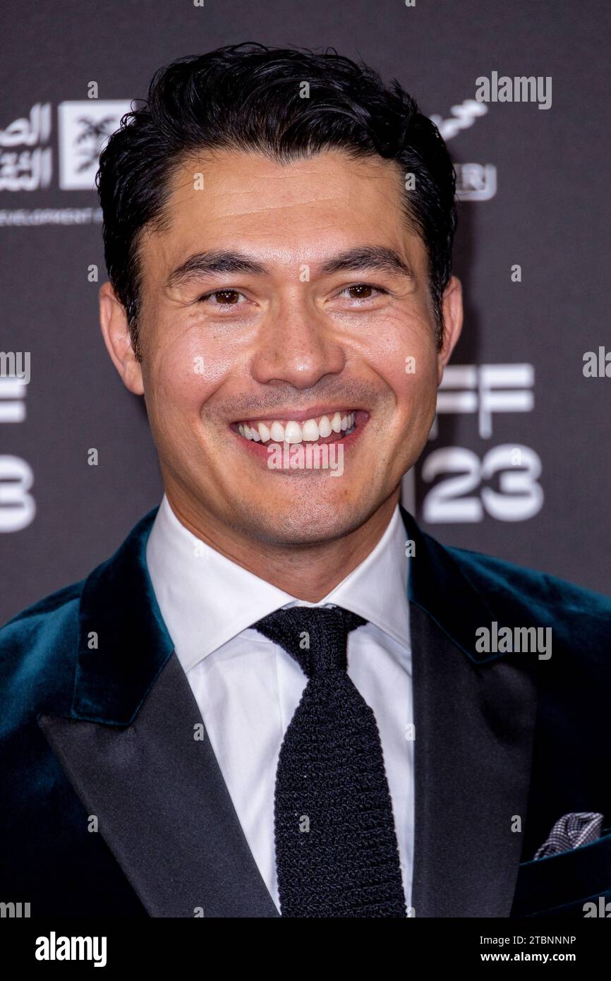 Henry Golding poses for photographers upon arrival for the closing ...