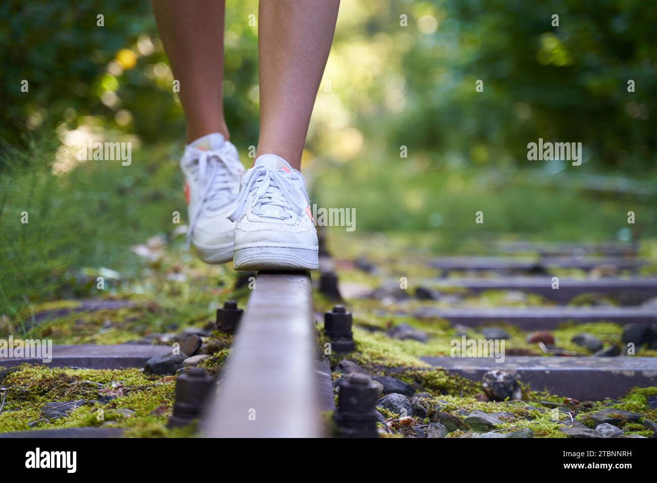 A Person's Feet Walking on a Rail in Switzerland on the Schipkapass ...