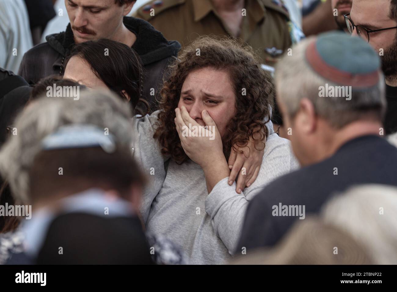 Herzliya, Israel. 08th Dec, 2023. Friends and family mourn at the ...