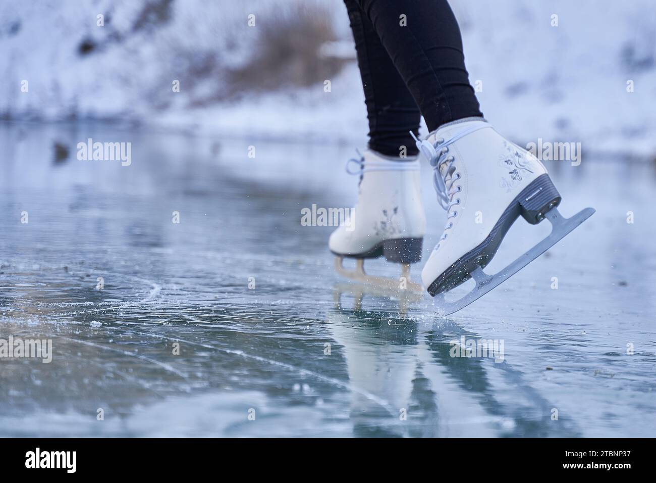 Graceful Glide Over Transparent Ice, A Winters Tale of Outdoor Ice ...