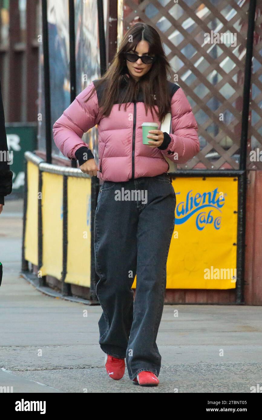Emily Ratajkowski wears a pink North Face puffer while out in New York ...