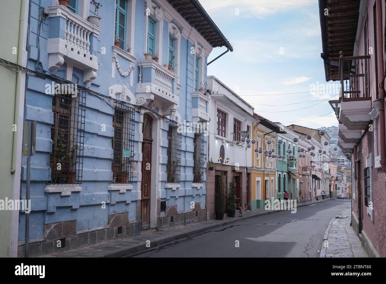 Colonial buildings in a quiet street in the center of Quito Stock Photo ...