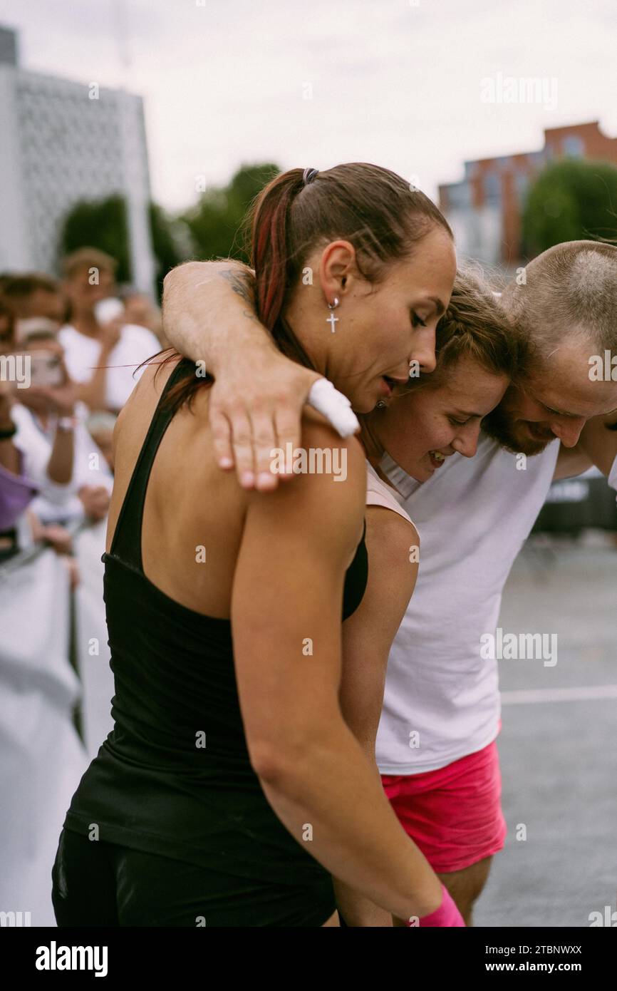 Group hug sport hi-res stock photography and images - Alamy
