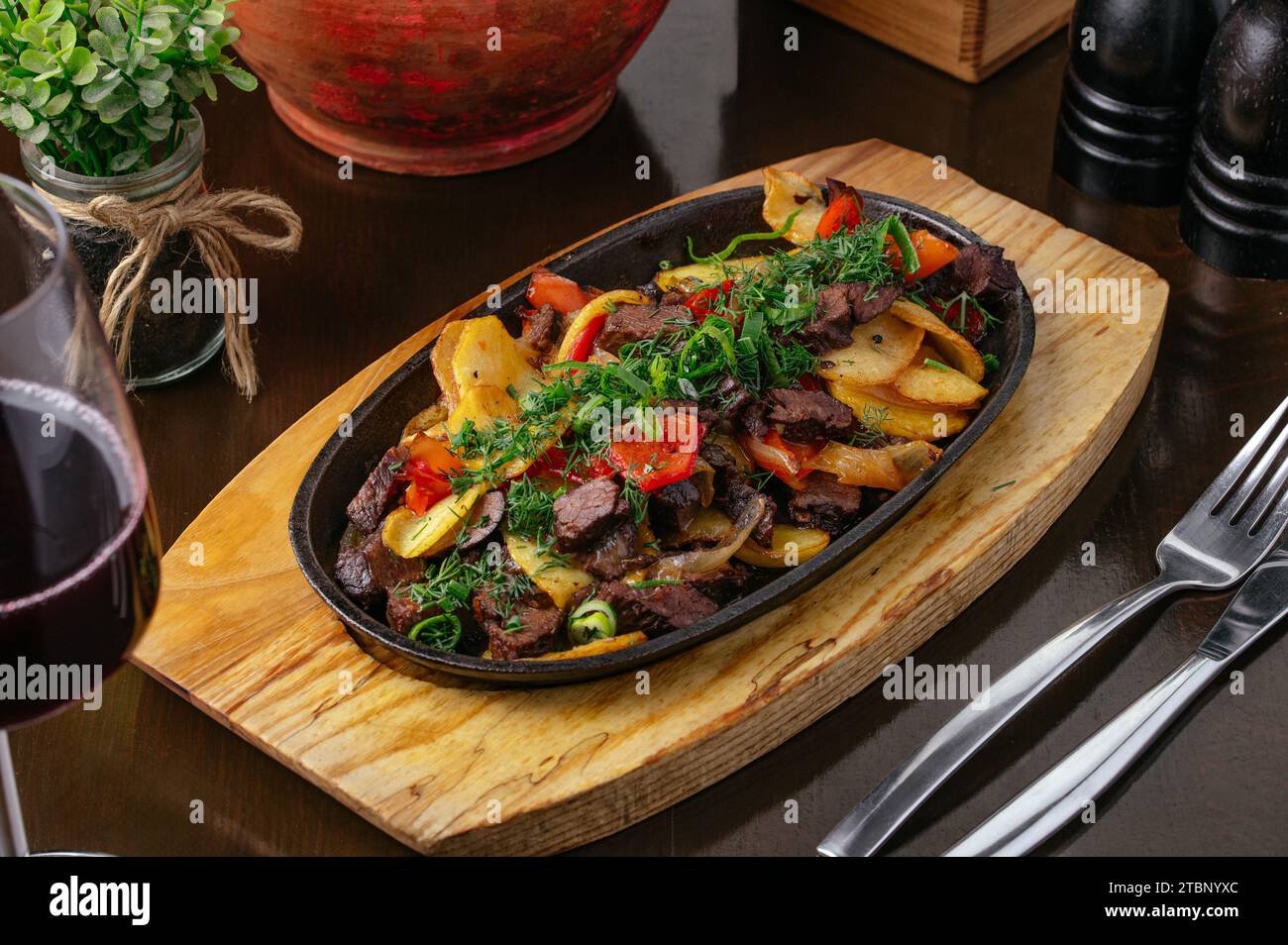 Baked beef with vegetables (carrots, peas, potatoes), horizontal Stock ...